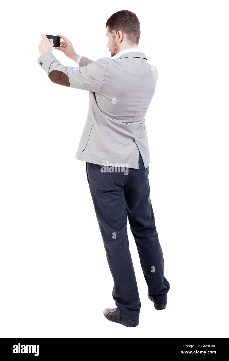 back view of business man on phone photographs Stock Photo - Alamy