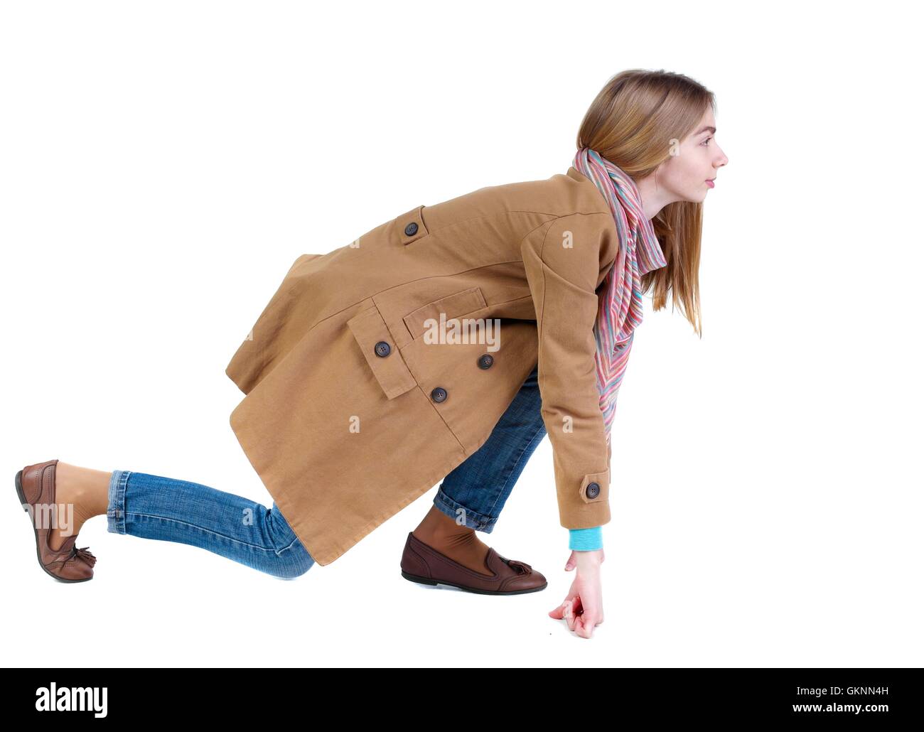 side view woman in cloak start position Stock Photo - Alamy