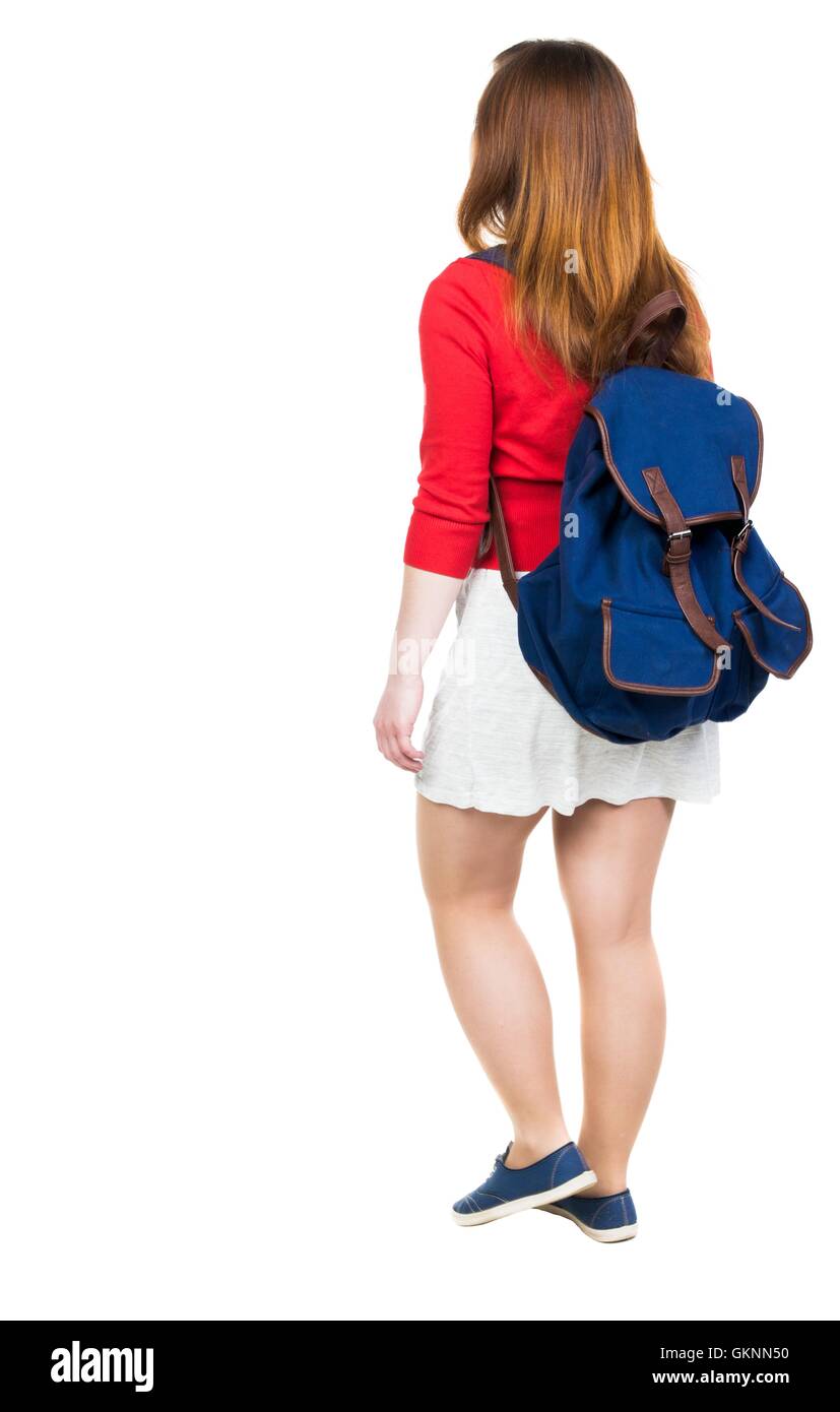 back view of walking woman in dress with backpack Stock Photo - Alamy