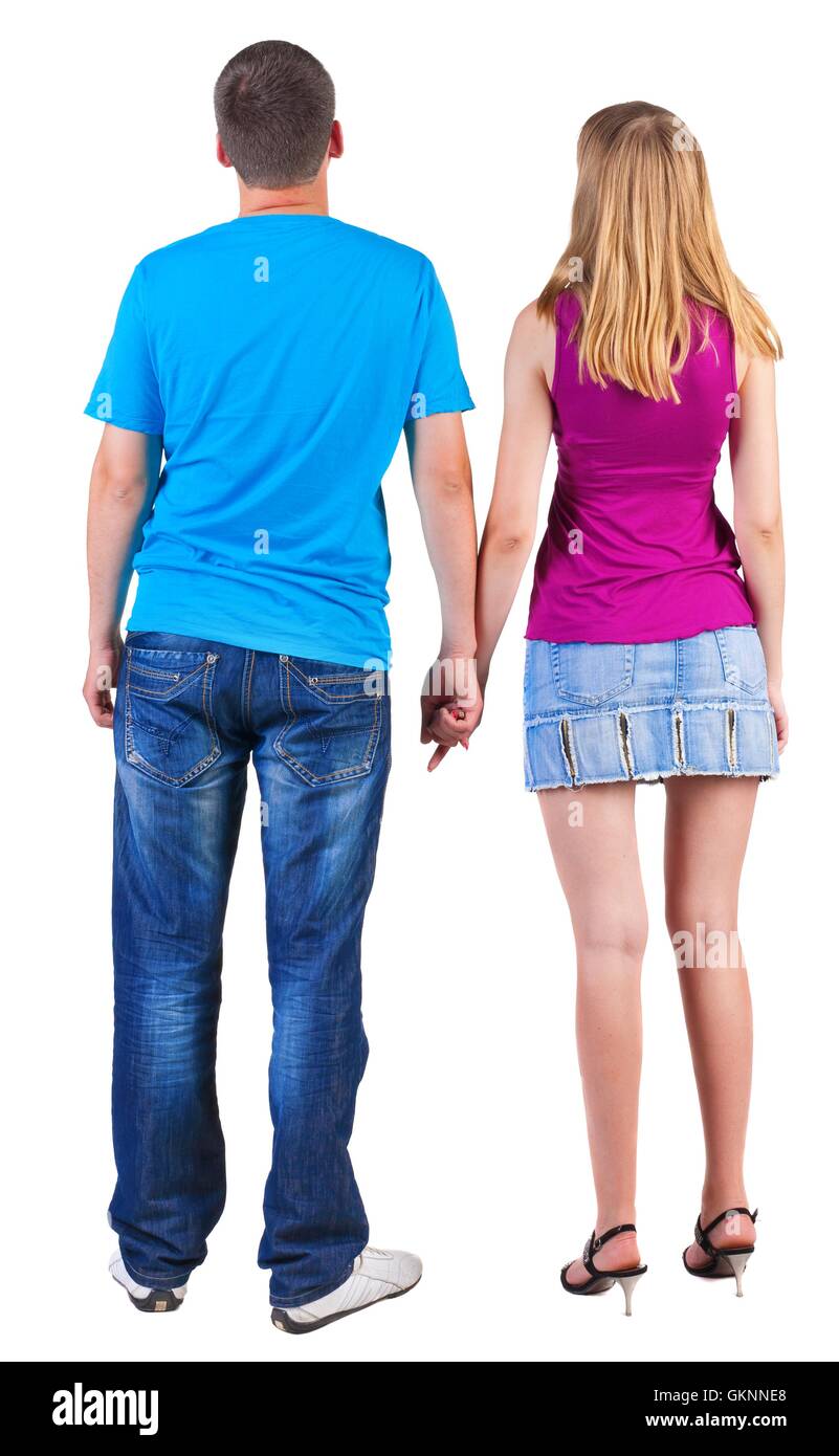 Back view of young embracing couple Stock Photo - Alamy