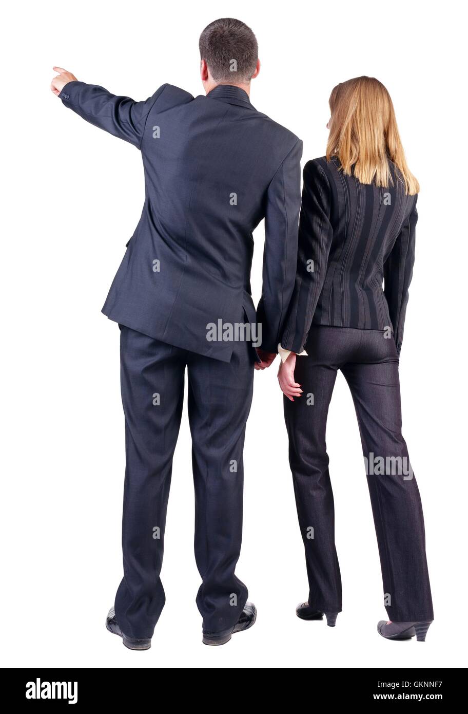 Back view of pointing business team Stock Photo - Alamy