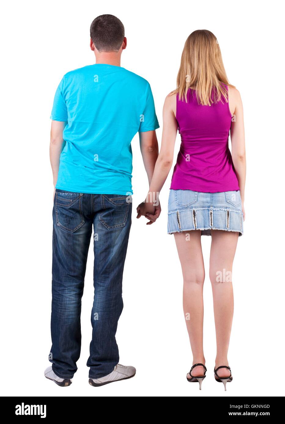 Back view of young embracing couple Stock Photo - Alamy