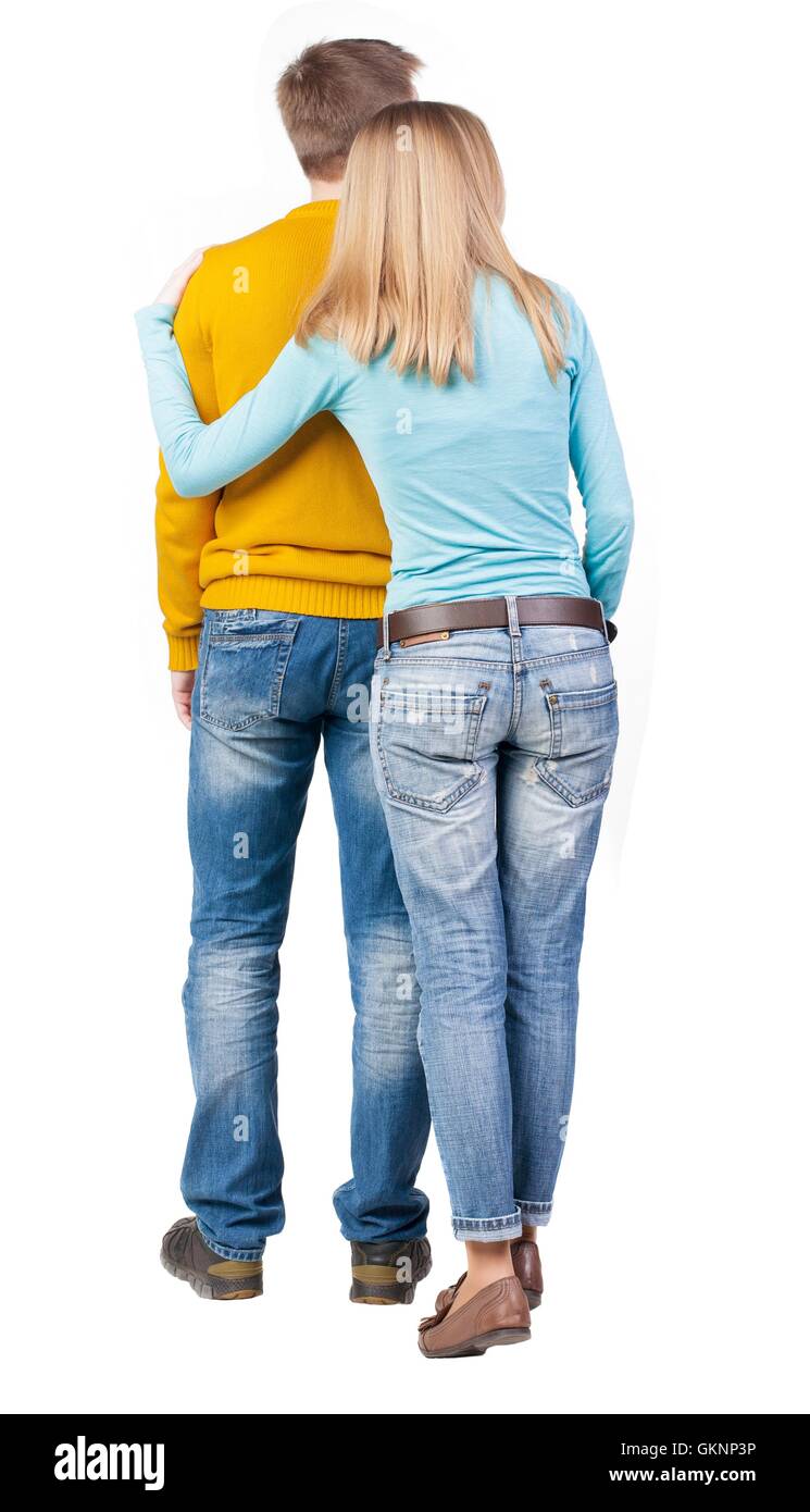 Back view of young embracing couple Stock Photo - Alamy