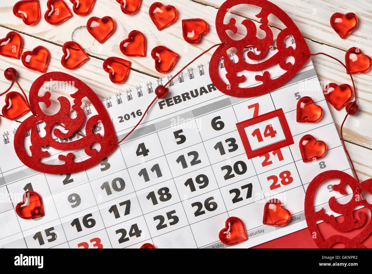 Calendar Valentines day and red hearts Stock Photo - Alamy