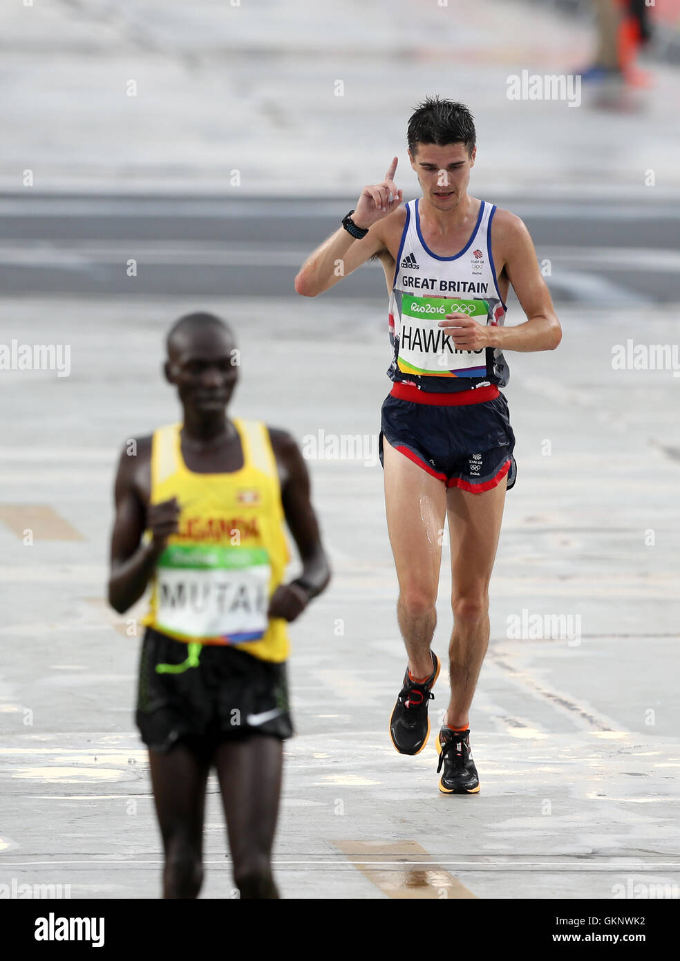 Great Britain's Callum Hawkins crosses the finish line in the Men's ...