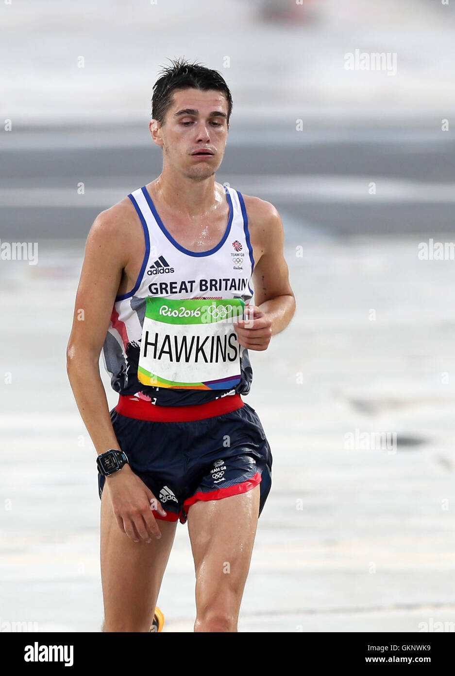 Great Britain's Callum Hawkins crosses the finish line in the Men's ...