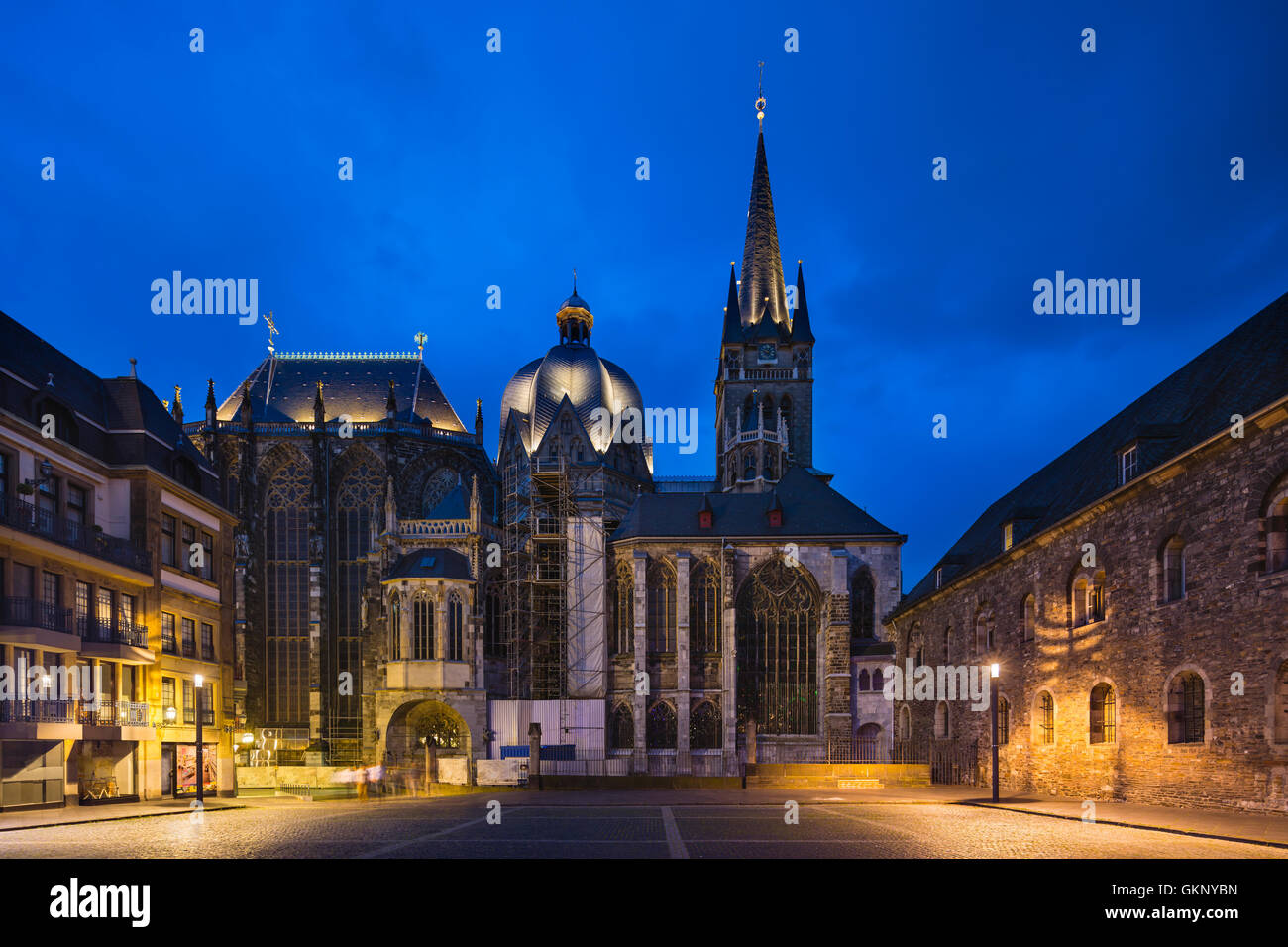 The famous cathedral of Aachen, Germany with night blue sky seen from ...