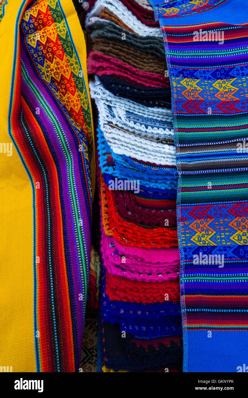 close up of traditional Peruvian textiles for sale in the market of ...