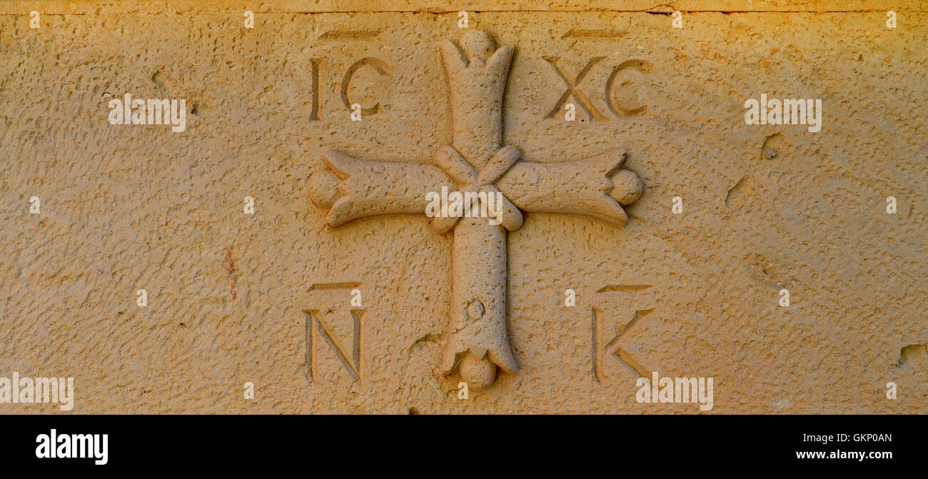 greek othodox cross religious symbol carved in stone Stock Photo - Alamy