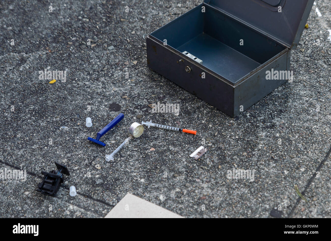 Drugs syringe in a box Stock Photo - Alamy