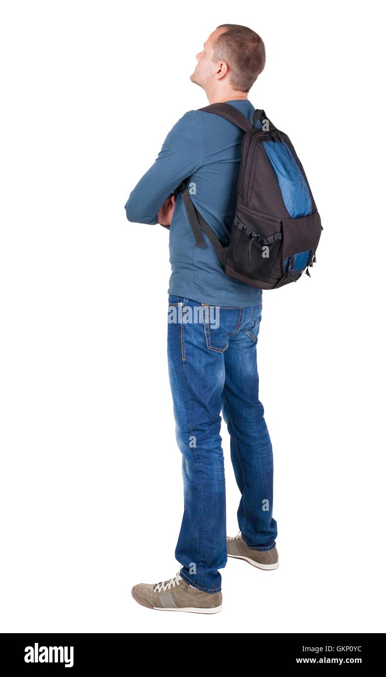 Back view of man with photographic backpack looking up Stock Photo - Alamy