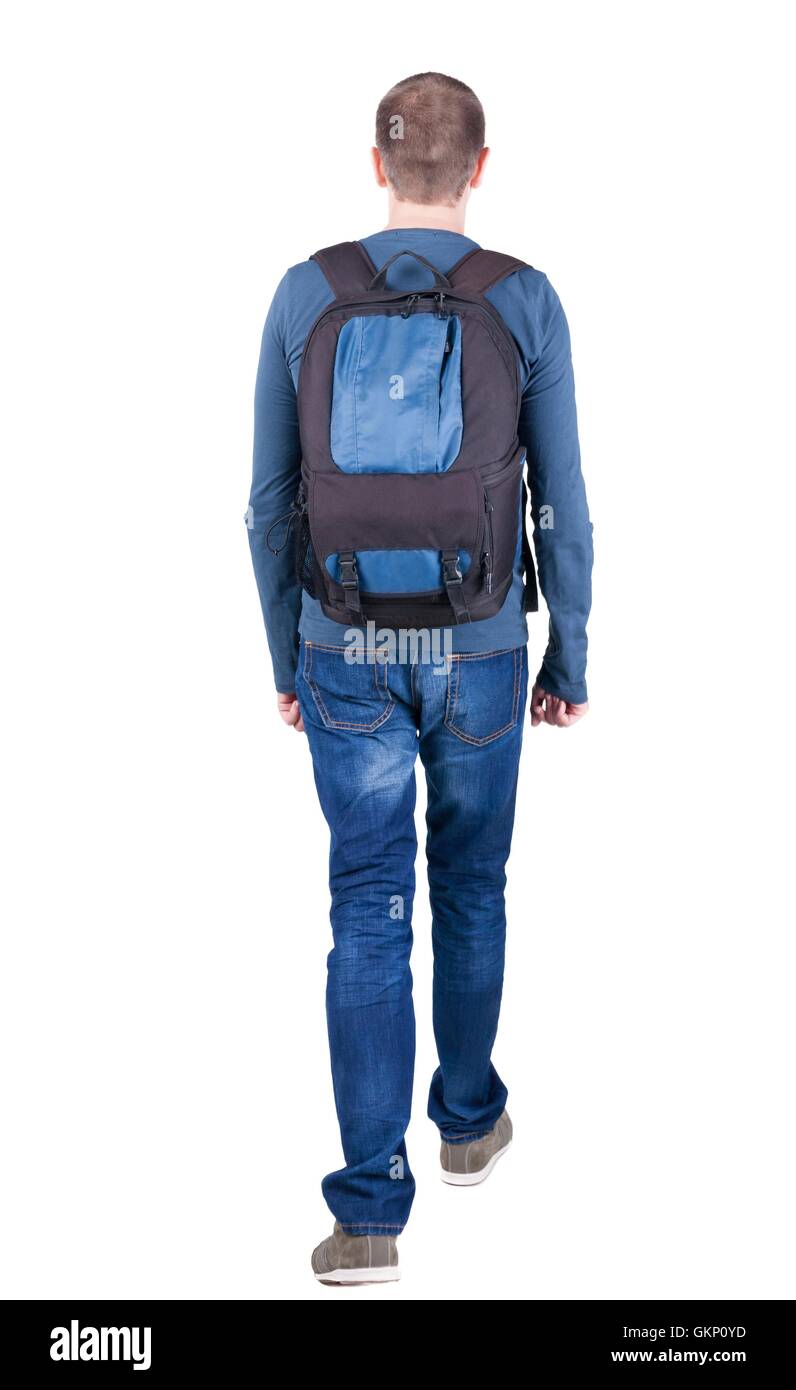back view of walking man with backpack Stock Photo - Alamy
