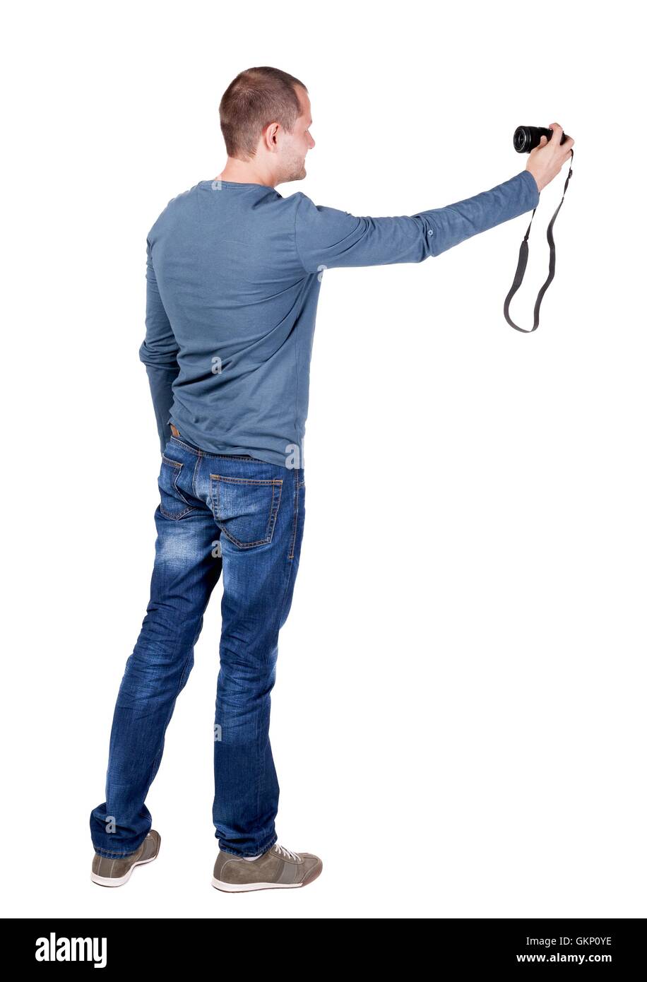 Back view of man photographing Stock Photo - Alamy