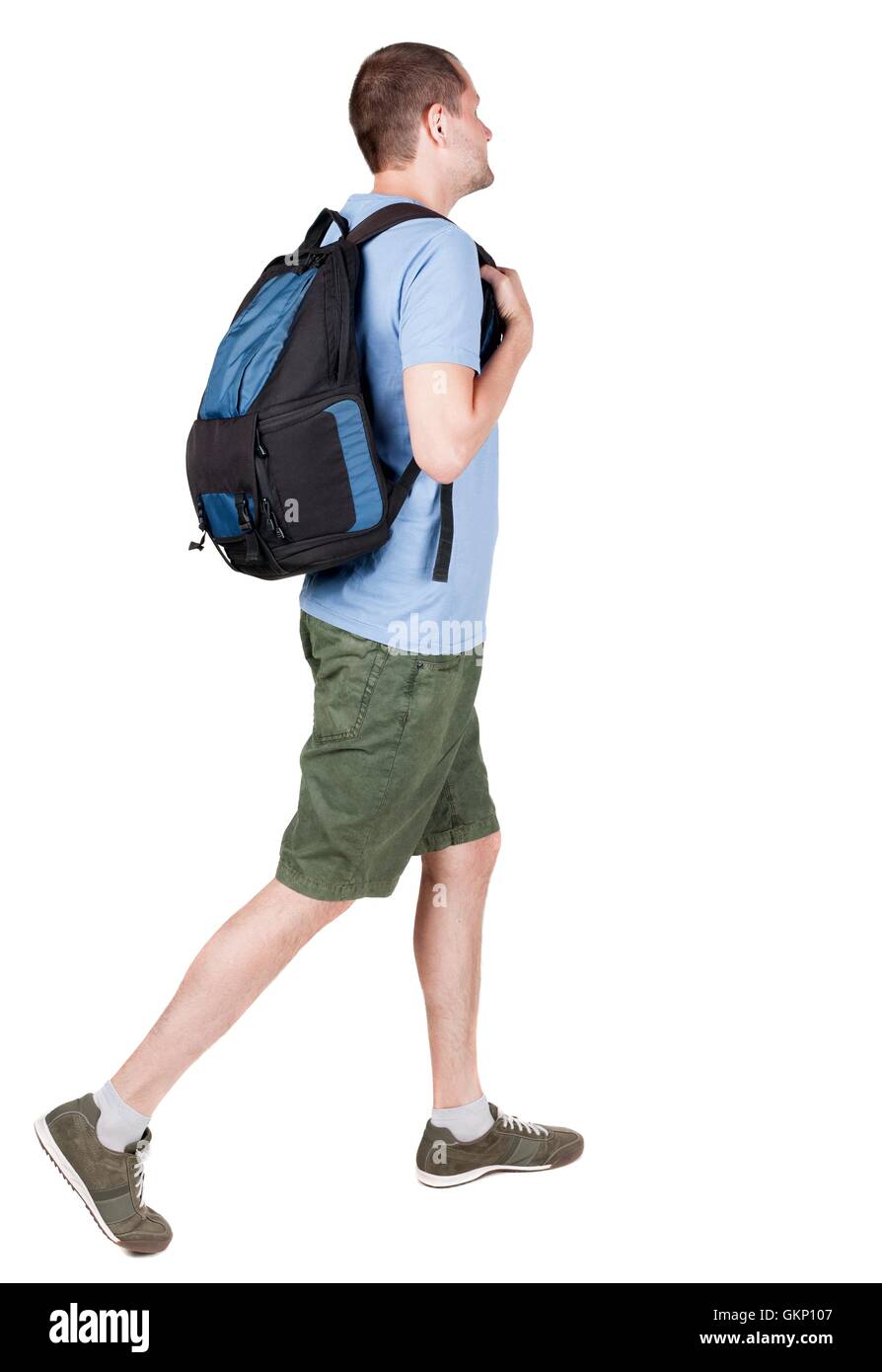 back view of walking man with backpack Stock Photo - Alamy