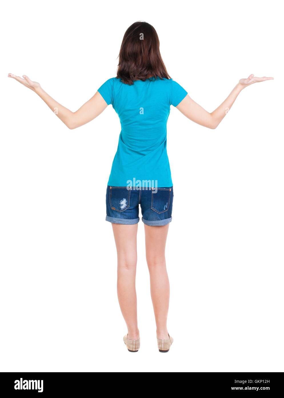 Back view of Beautiful woman in in sandals holds hand up Stock Photo ...