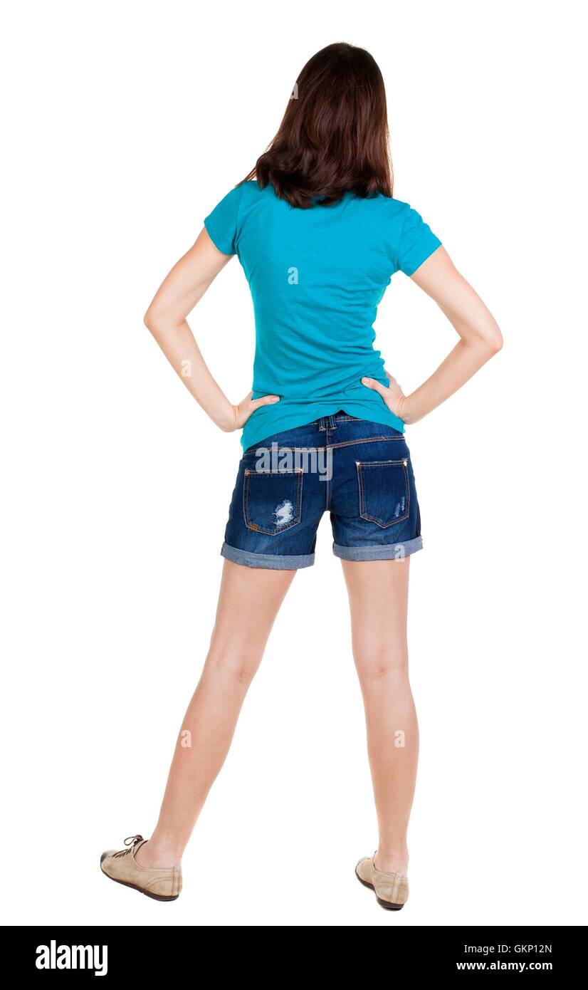 back view of standing young beautiful brunette woman in shorts Stock ...
