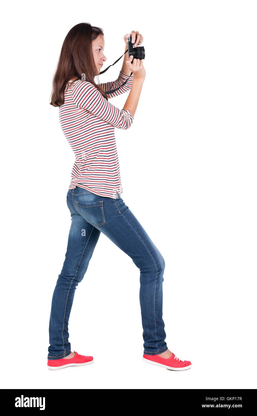 Back view of woman photographing Stock Photo - Alamy