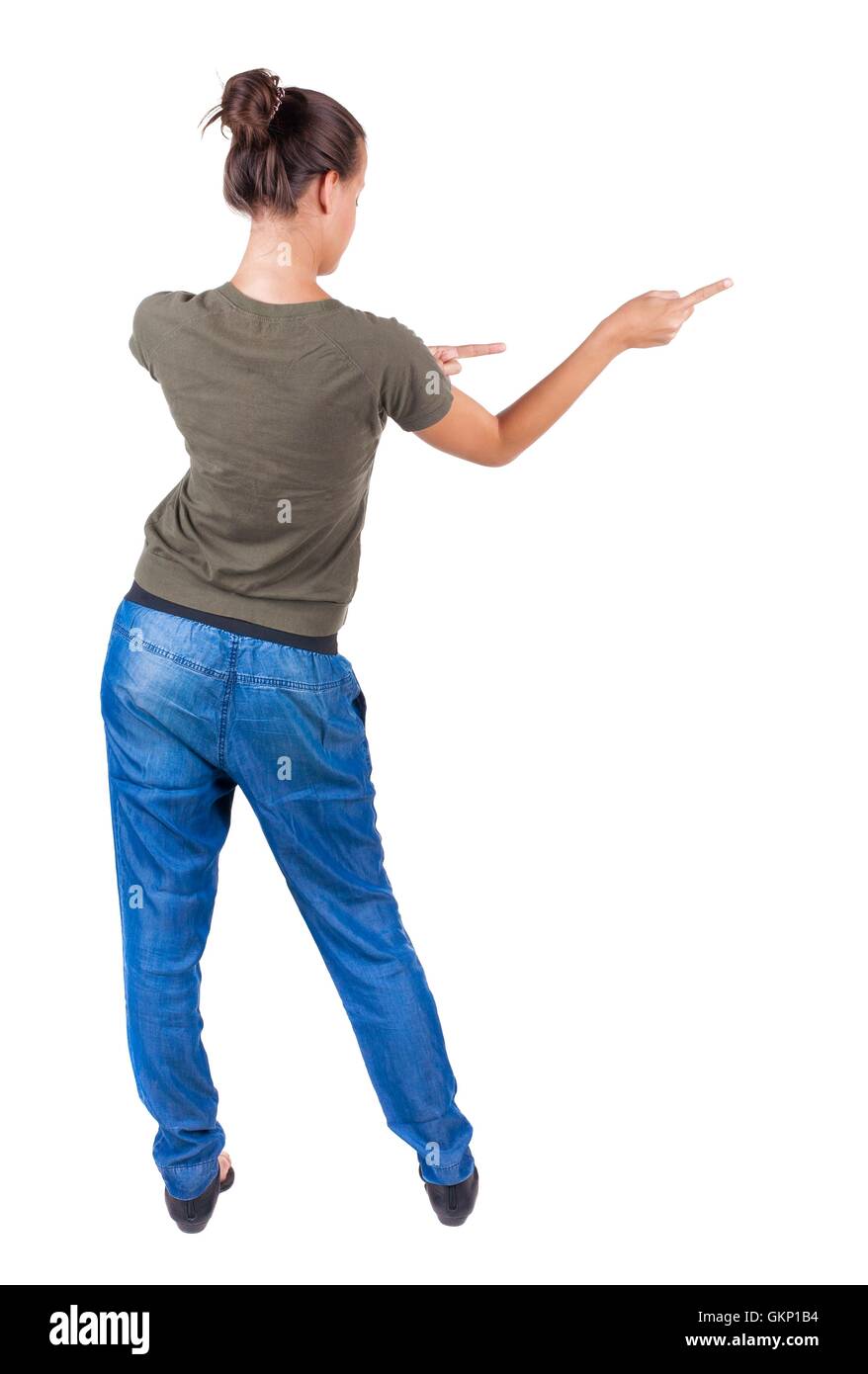 Back view of pointing woman Stock Photo - Alamy
