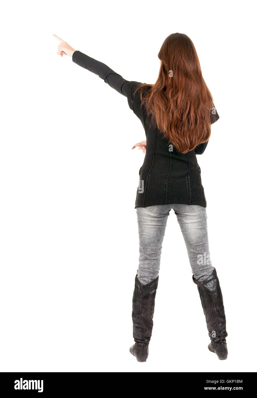 Back view of pointing woman Stock Photo - Alamy