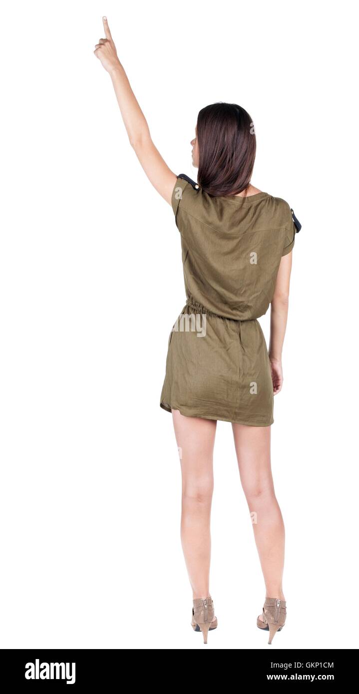 Back view of pointing woman Stock Photo - Alamy
