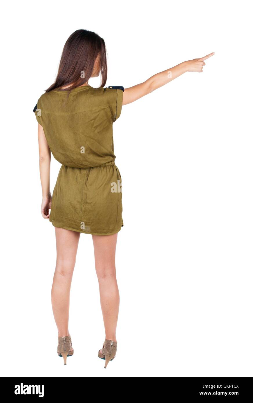 Back view of pointing woman Stock Photo - Alamy
