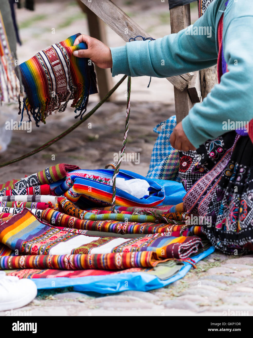 close up of traditional Peruvian textiles for sale in the market of ...