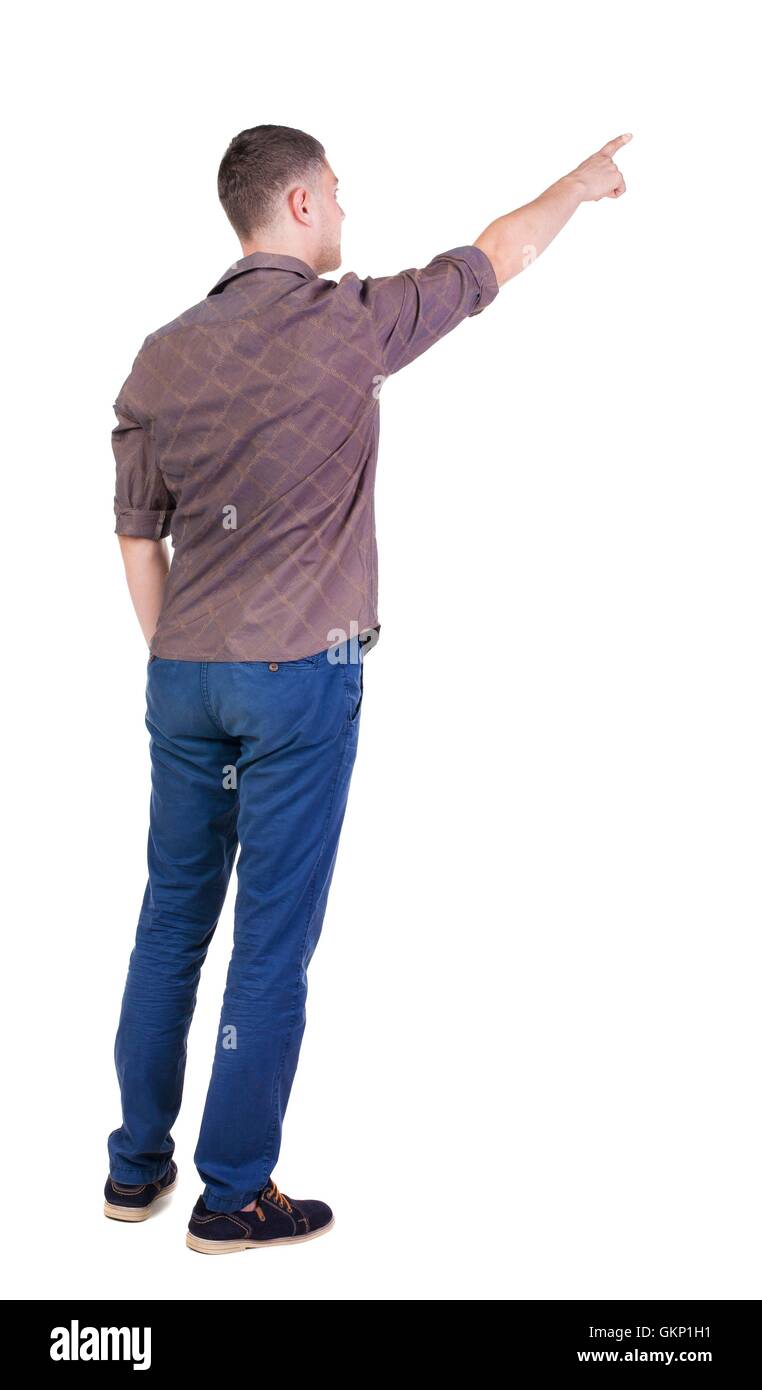 Back view of pointing young men in shirt and jeans Stock Photo - Alamy