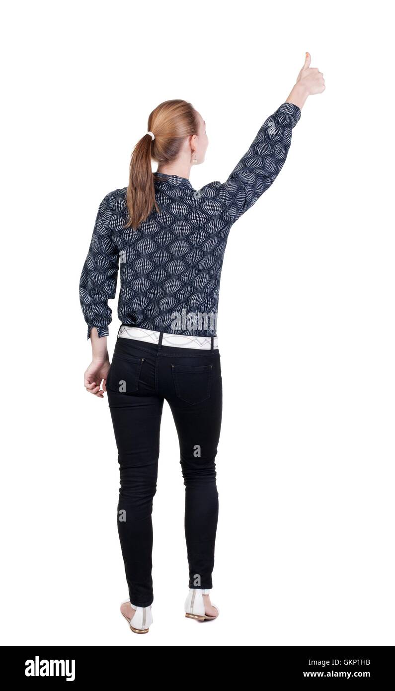 Back view of pointing woman Stock Photo - Alamy