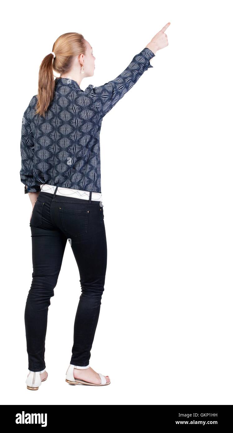 Back view of pointing woman Stock Photo - Alamy