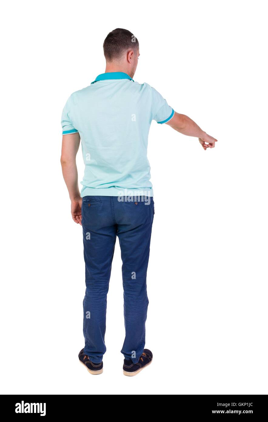 Back view of pointing young men in shirt and jeans Stock Photo - Alamy