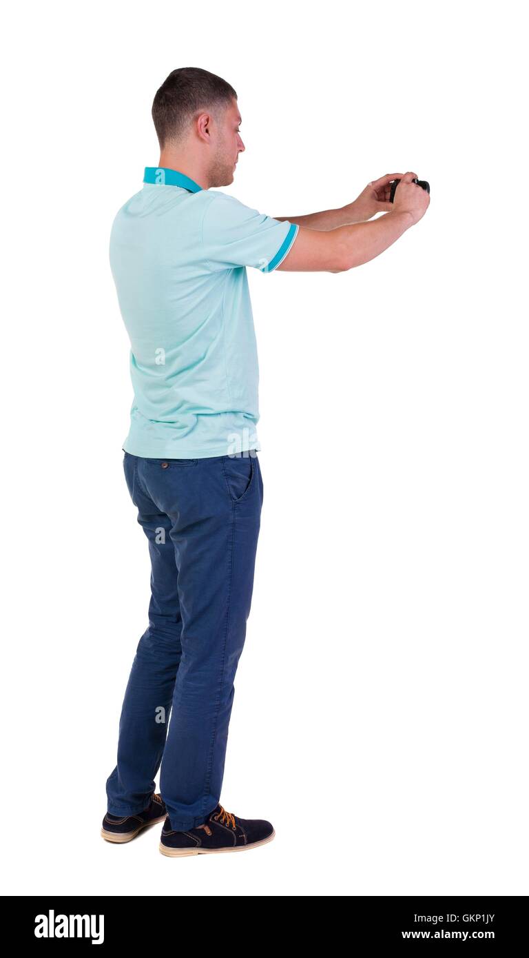 Back view of man photographing. tourist with camera Stock Photo - Alamy