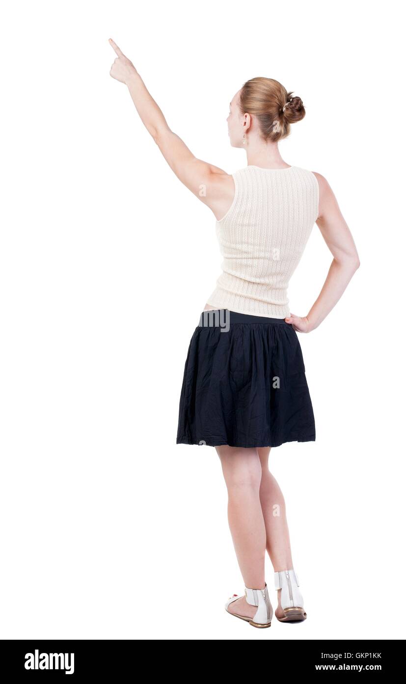 Back view of pointing woman Stock Photo - Alamy