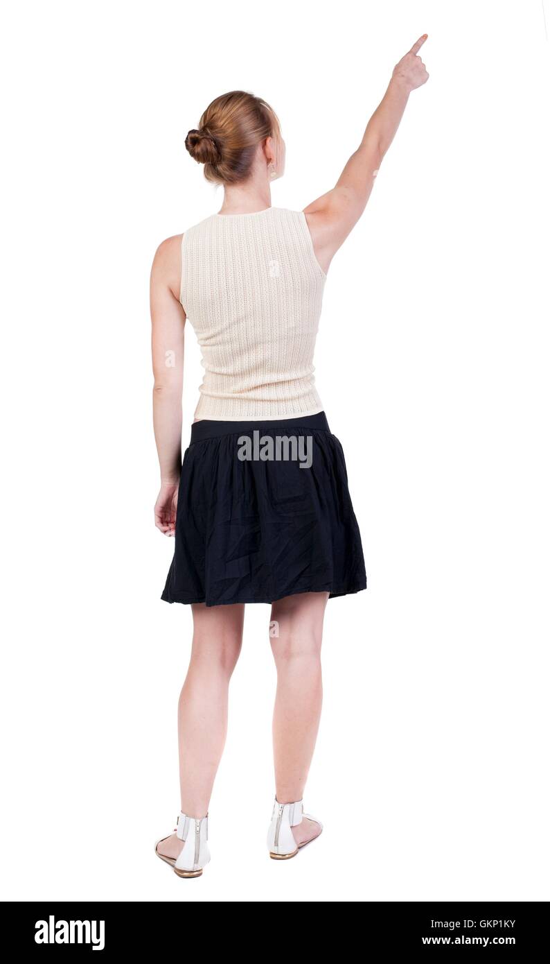 Back view of pointing woman Stock Photo - Alamy