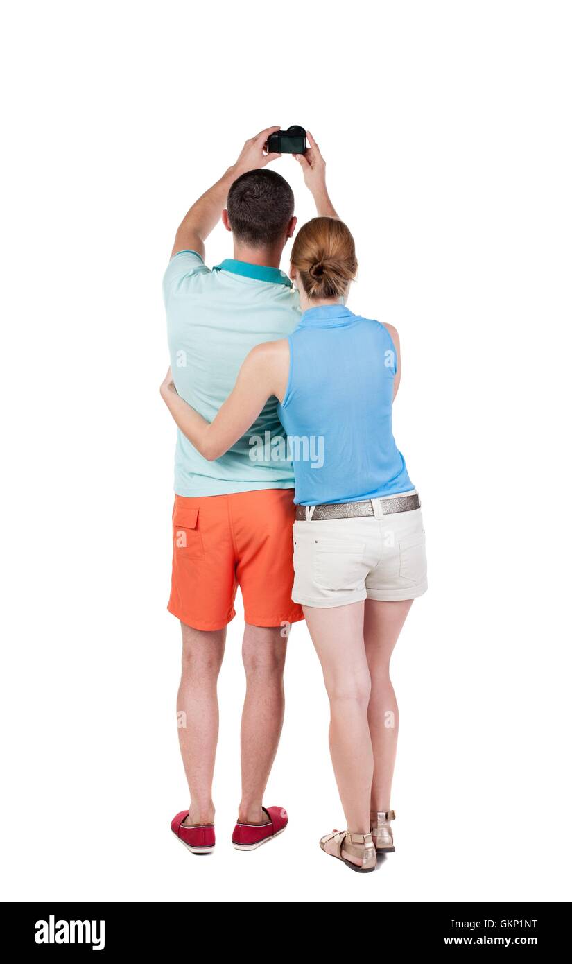 Back view of couple photographing Stock Photo - Alamy