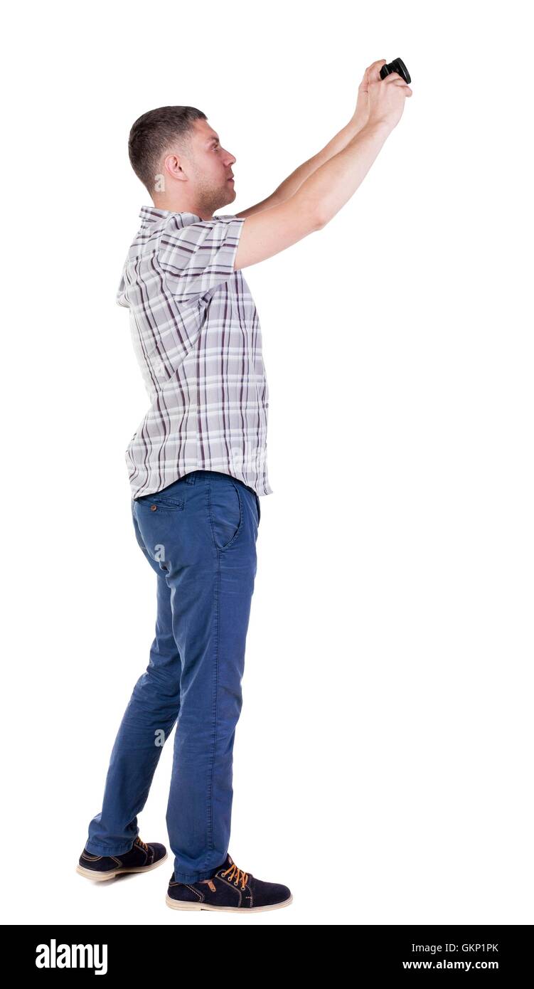 Back view of man photographing. tourist with camera Stock Photo - Alamy