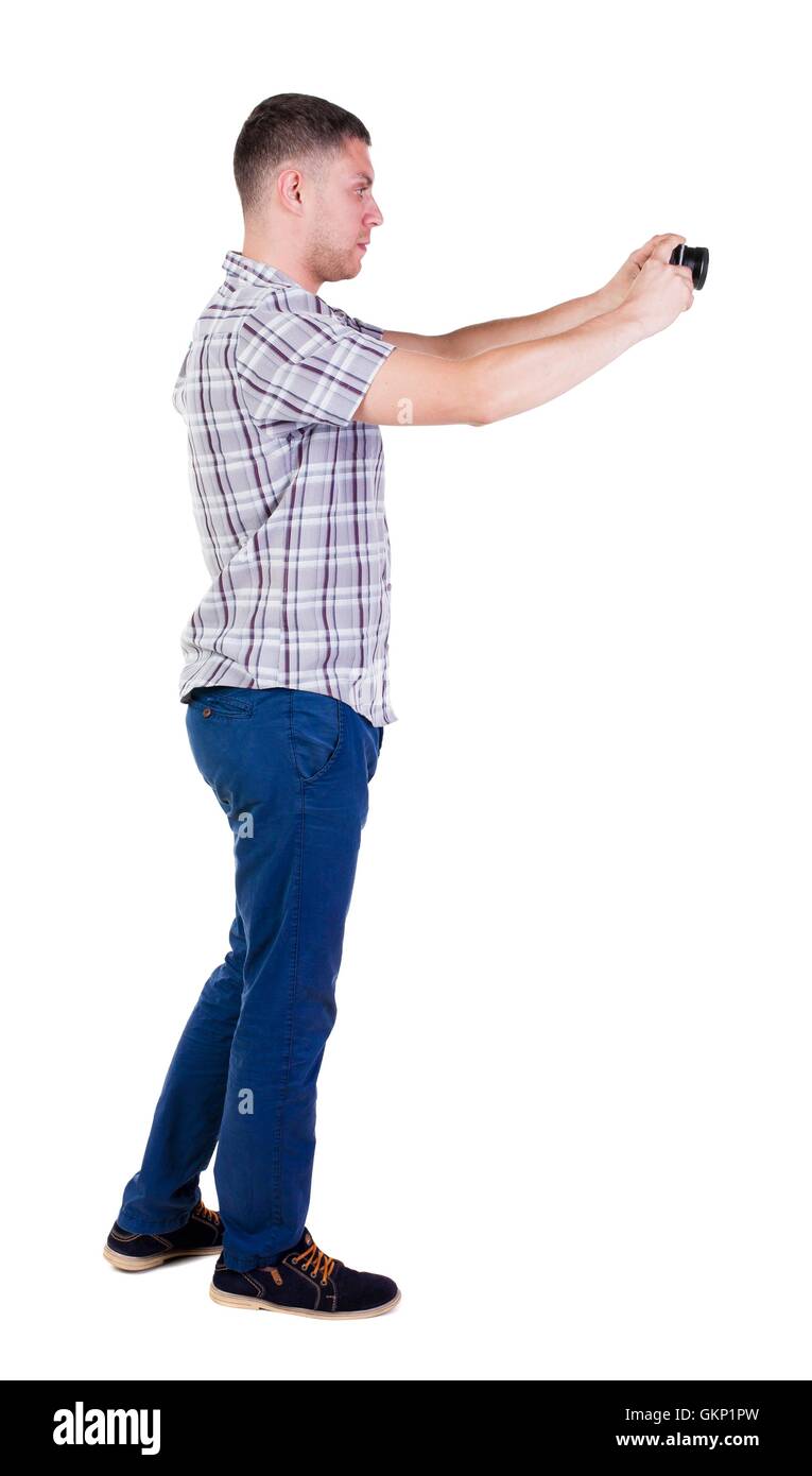 Back view of man photographing. tourist with camera Stock Photo - Alamy