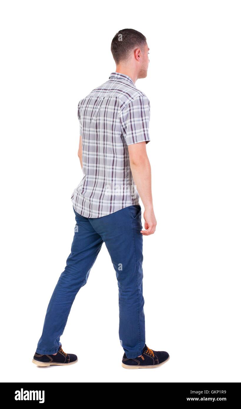 Back view of going handsome man in jeans and a shirt Stock Photo - Alamy