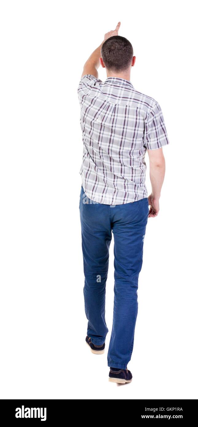 Back view of going handsome man in jeans and a shirt Stock Photo - Alamy