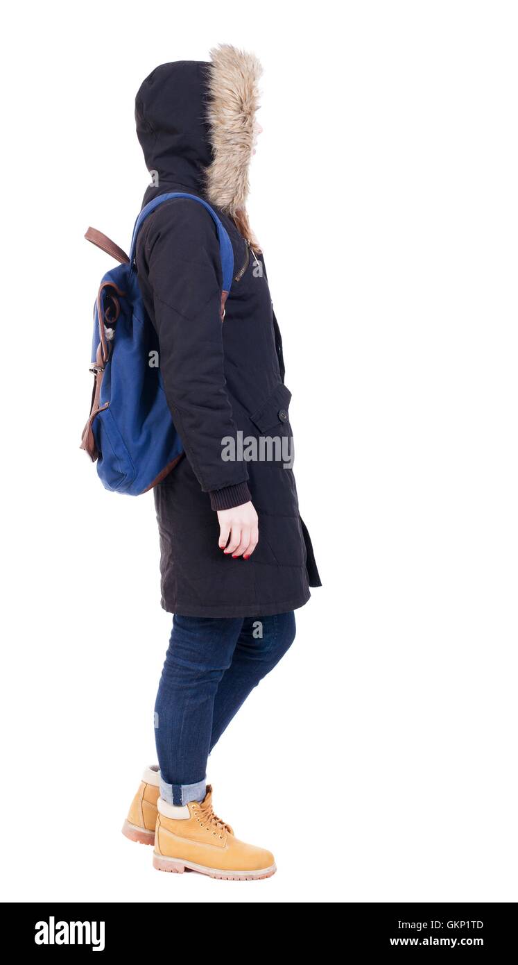 Back view woman in winter jacket with backpack Stock Photo - Alamy