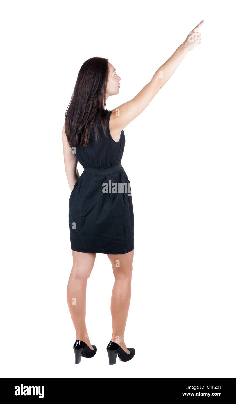 Back view of pointing woman Stock Photo - Alamy
