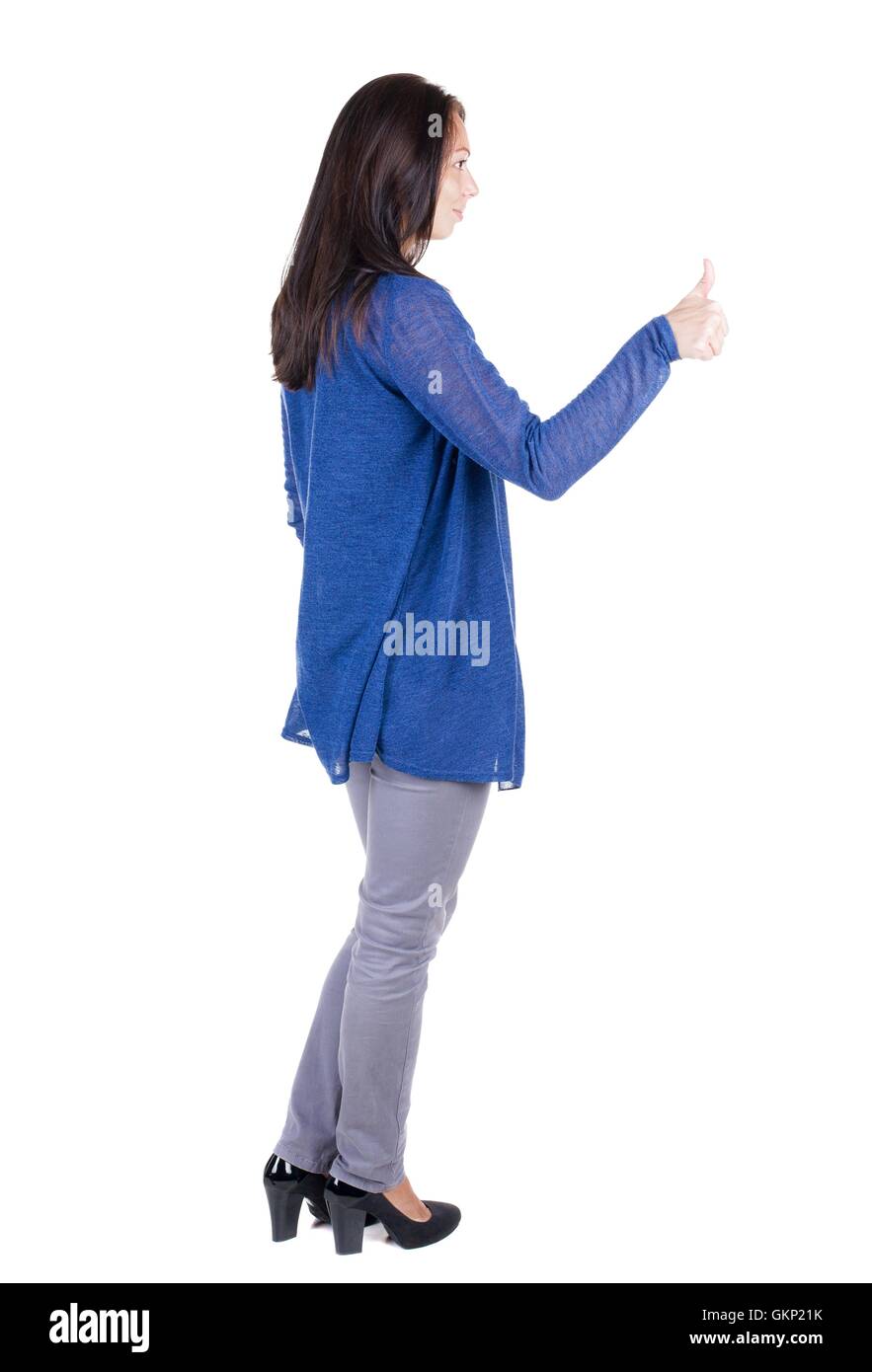 Back view of woman thumbs up Stock Photo - Alamy