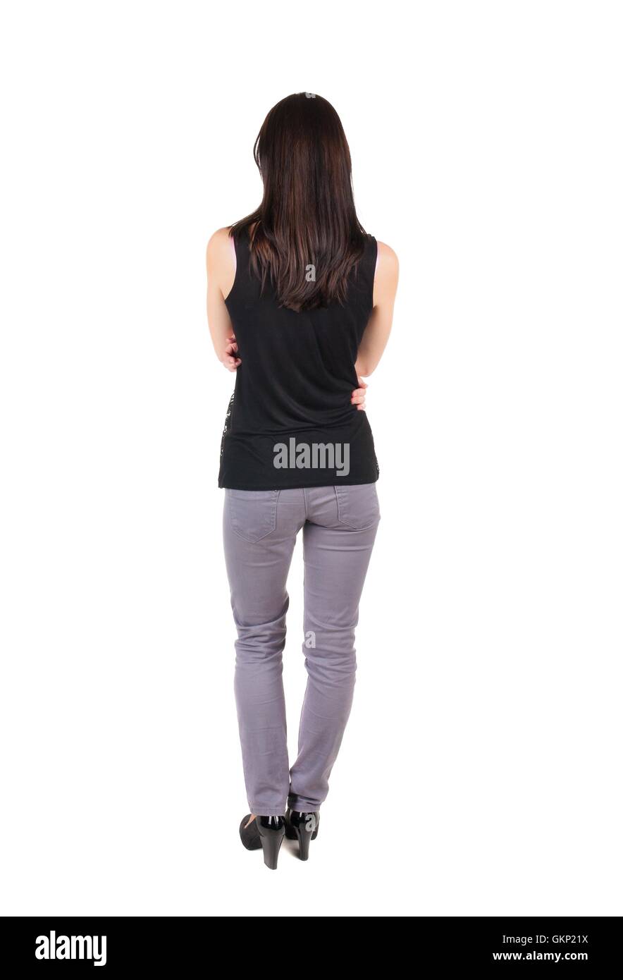 back view of standing young beautiful woman Stock Photo - Alamy