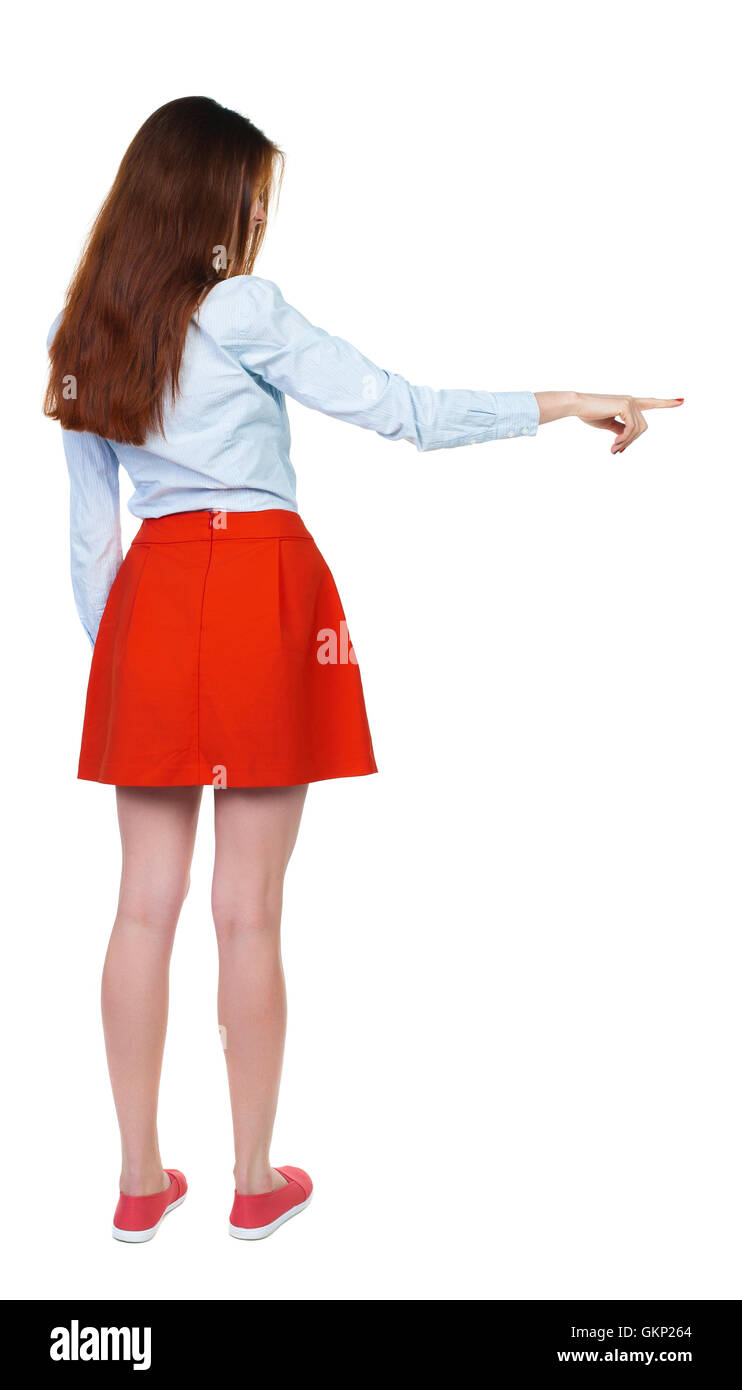 Back view of pointing woman Stock Photo - Alamy