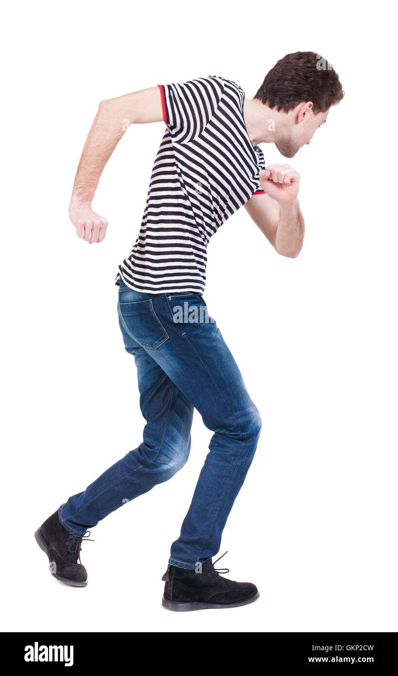 Back view of running man. Walking guy in motion Stock Photo - Alamy