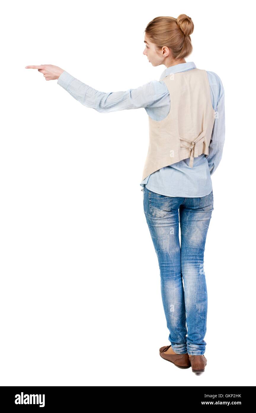 Back view of pointing woman Stock Photo - Alamy