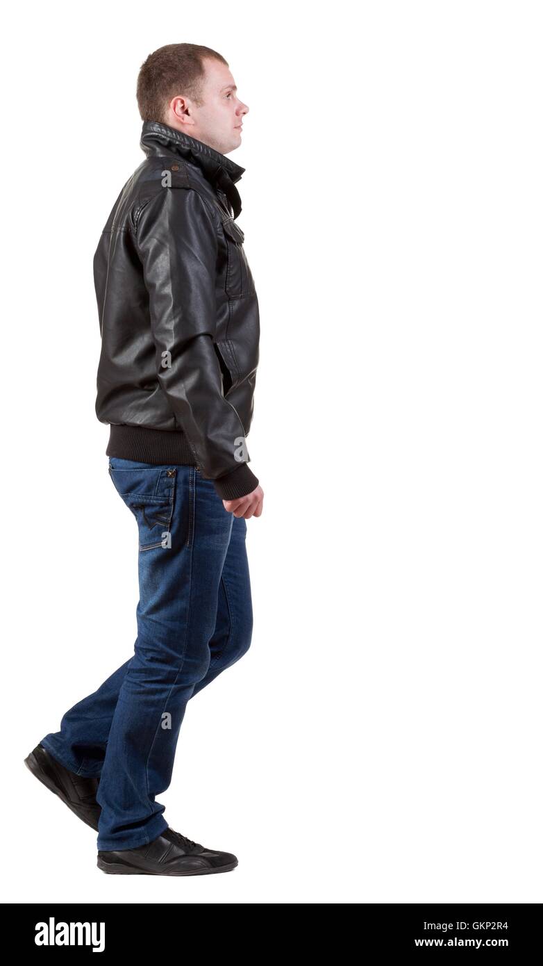 Back view of walking handsome man Stock Photo - Alamy