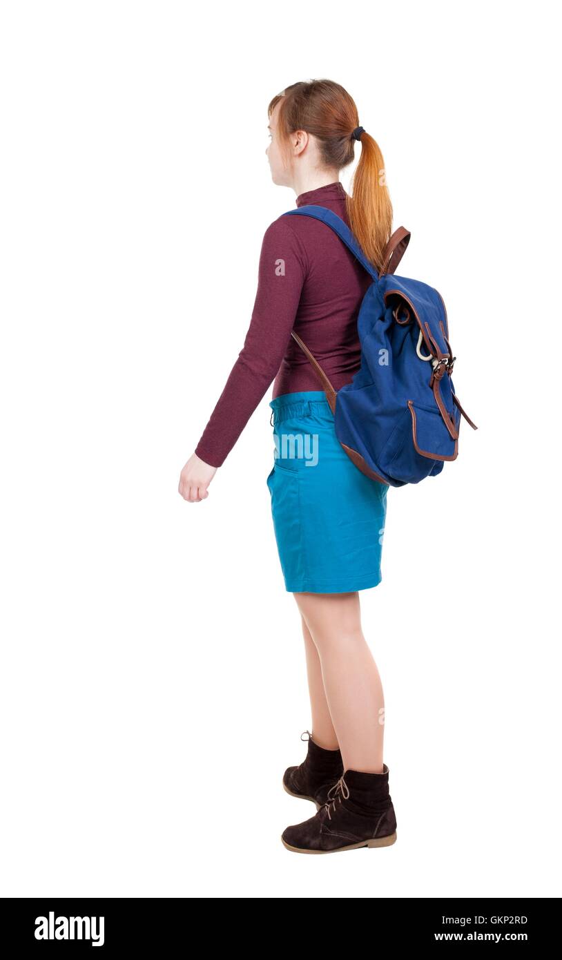 Back view of woman with backpack looking up Stock Photo - Alamy