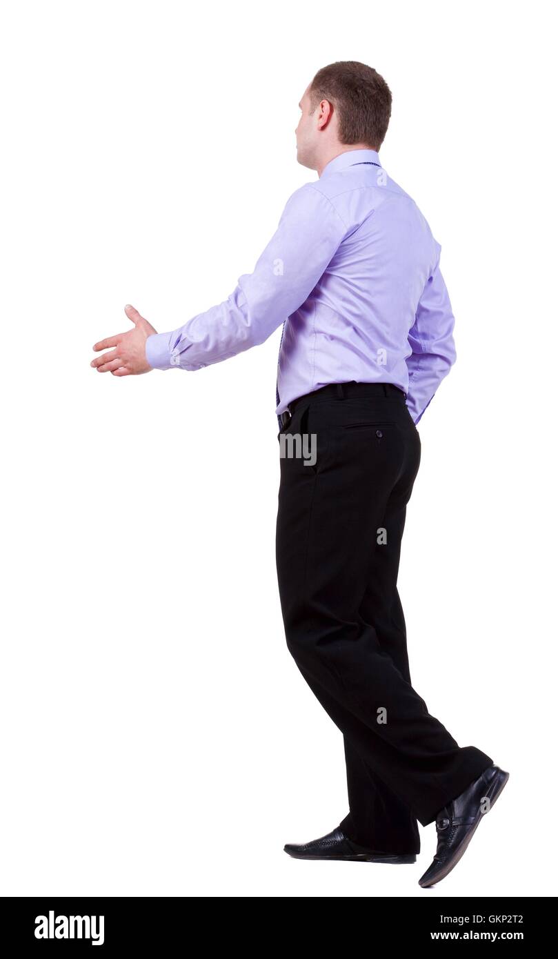 back view of walking business man hand shake Stock Photo - Alamy