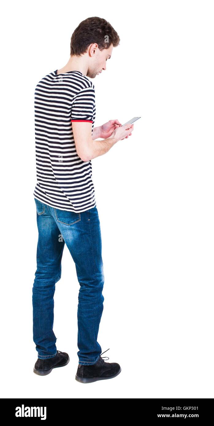 back view of man in suit talking on mobile phone Stock Photo - Alamy