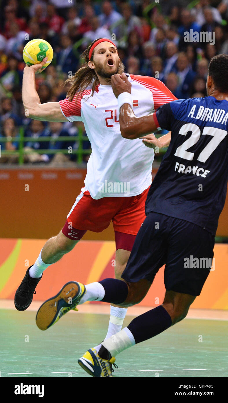 Rio de Janeiro, Brazil. 21st Aug, 2016. Mikkel Hansen (L) of Denmark ...